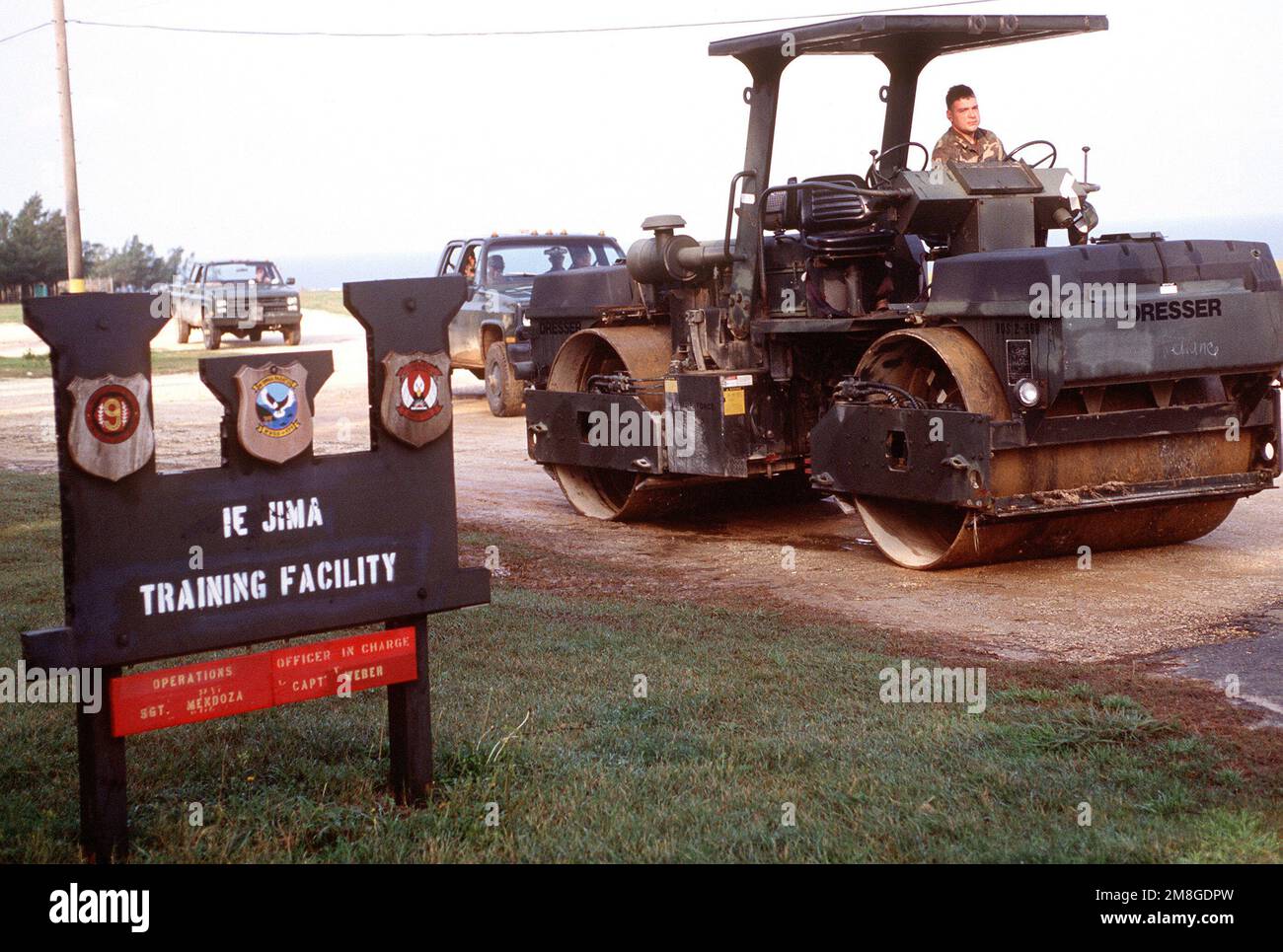 A member of the 554th Civil Engineering Squadron RED HORSE (Rapid ...