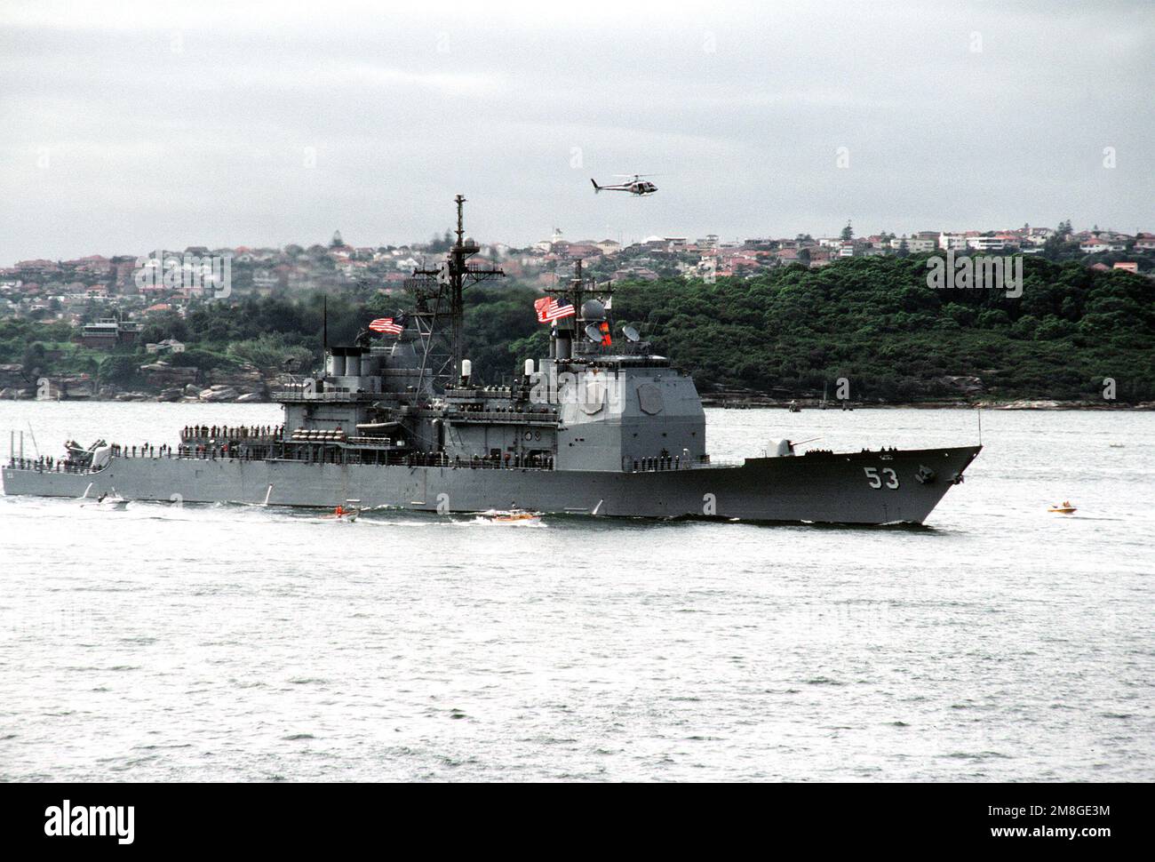 Sailors man the rails aboard the guided missile cruiser USS MOBILE BAY ...