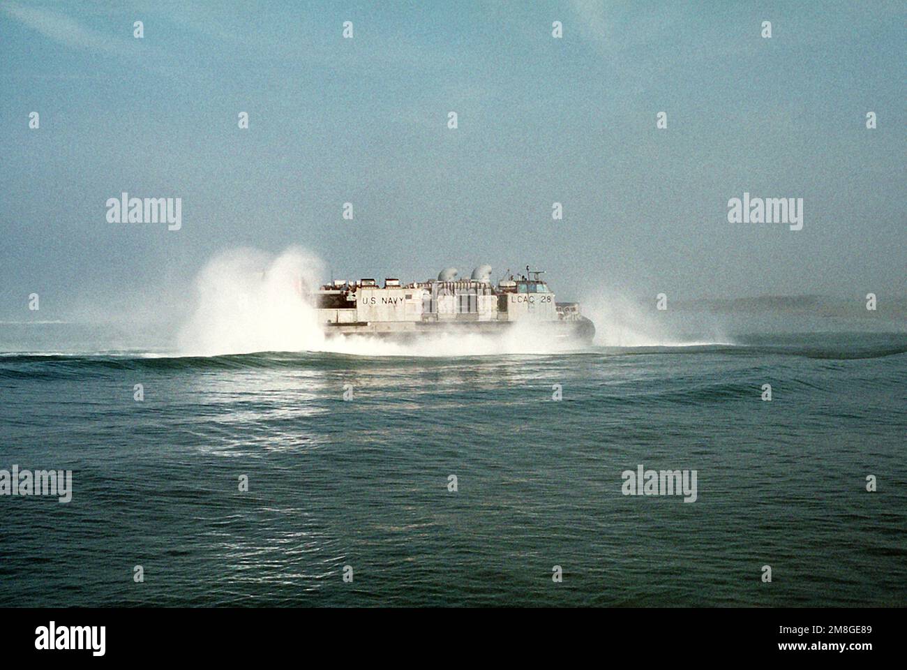 Air-cushion landing craft LCAC-28 approaches the shore during Exercise ...