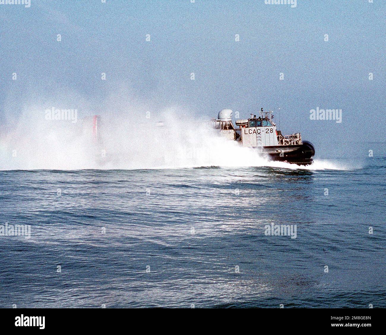 A starboard bow view of air-cushion landing craft LCAC-28 underway ...