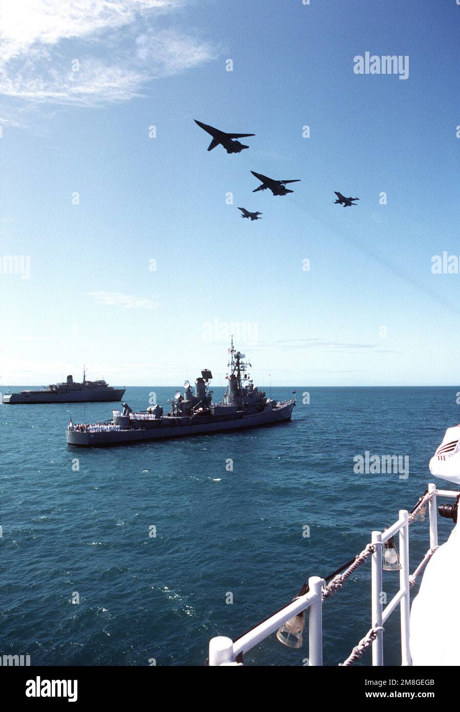 F-16 Fighting Falcon and F-111 aircraft fly in formation over the ...