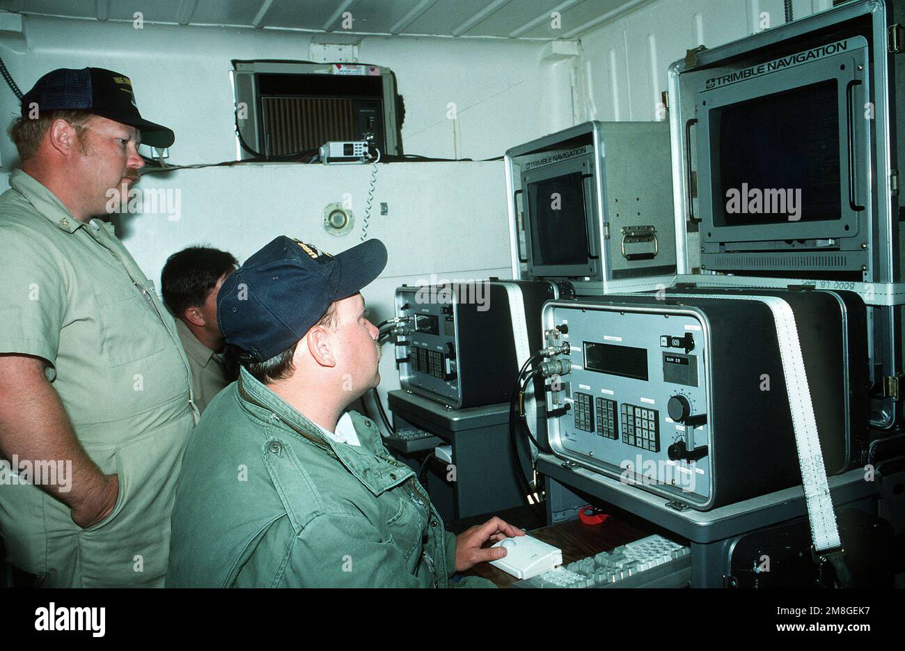 Quartermaster's Mate 1ST Class Evan J. Soskin operates a self-propelled ...