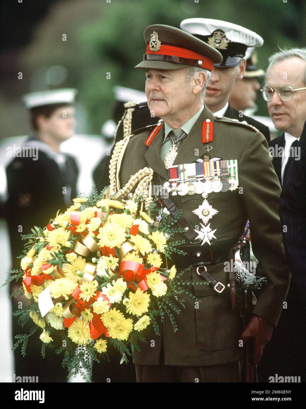 GEN Sir Phillip Bennet, royal governor of Tasmania, prepares to place a ...