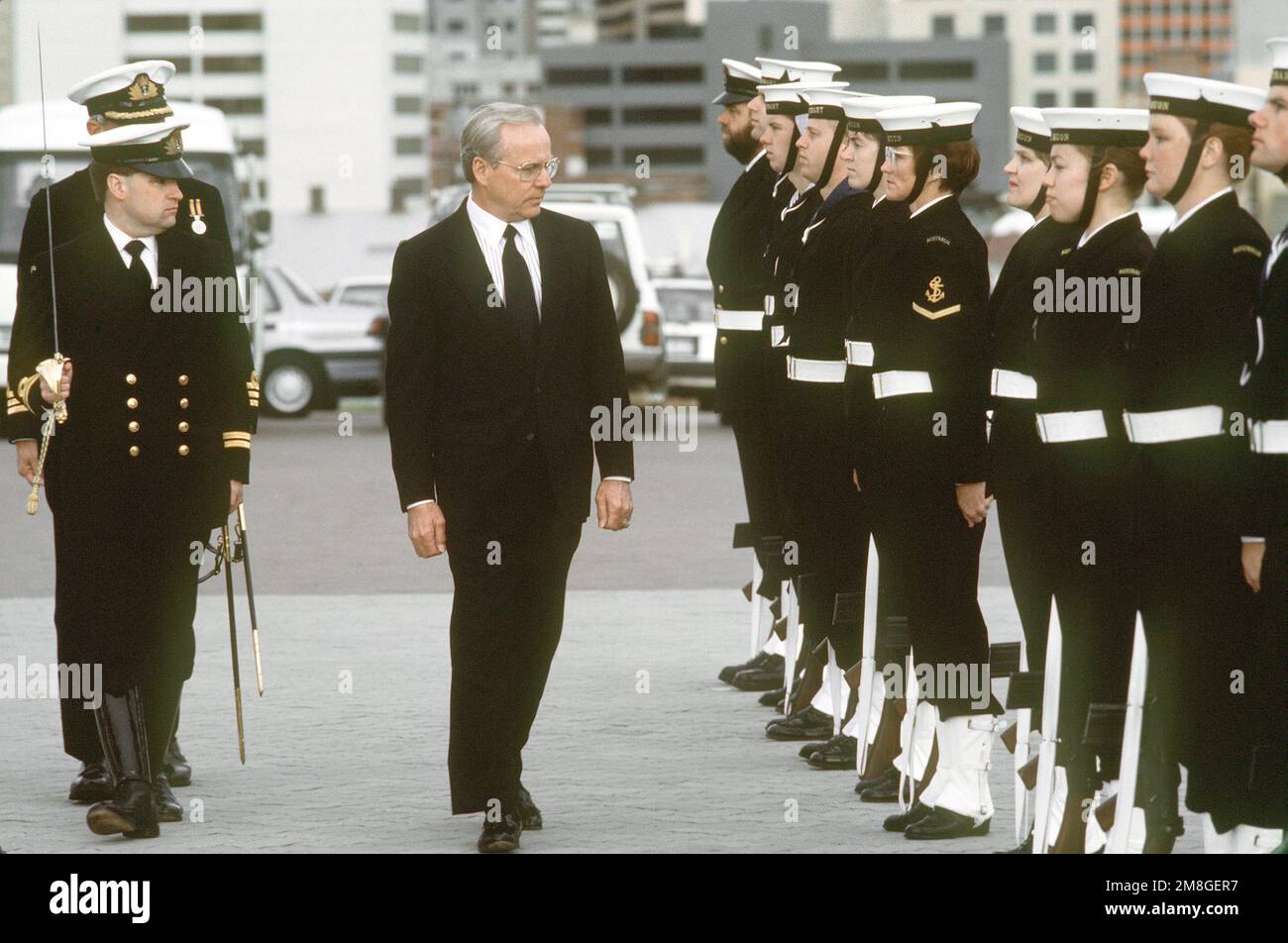 Secretary of the Navy H. Lawrence Garrett III reviews a Royal ...
