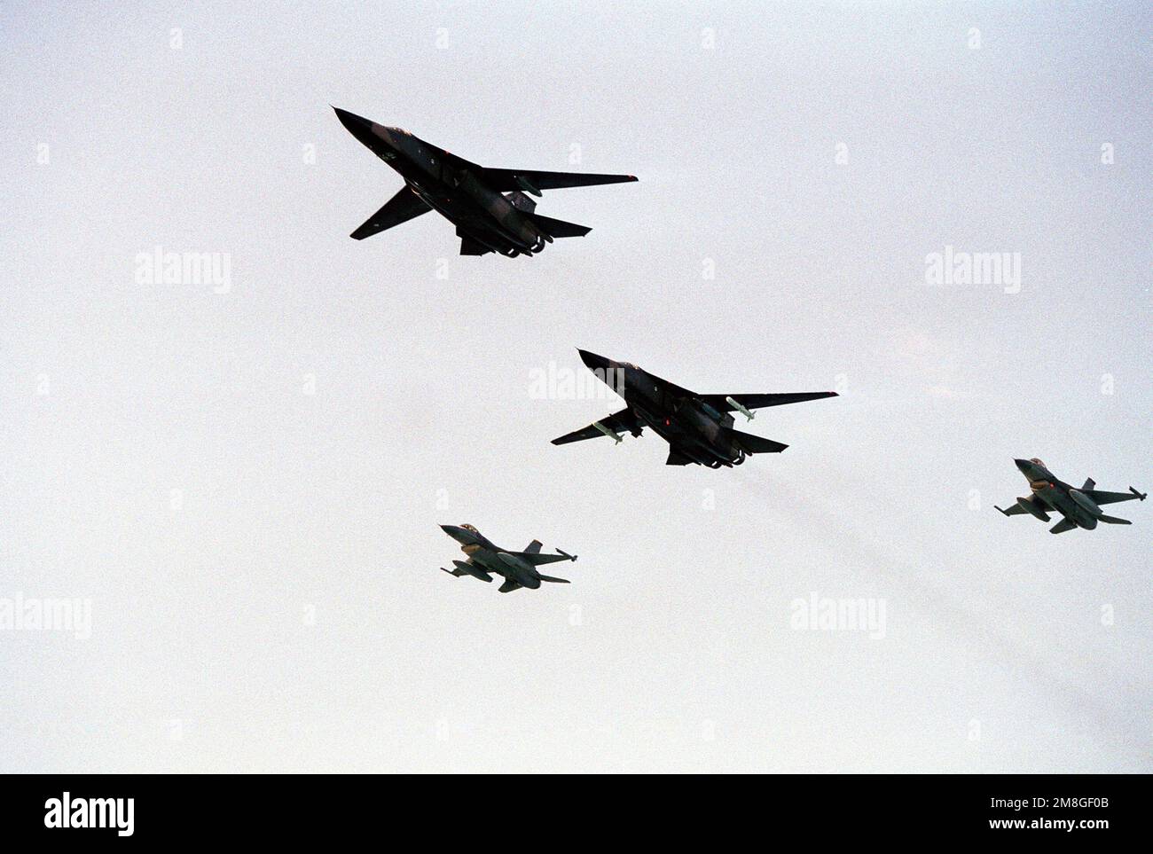 Two Royal Australian FB-111 Ardvark fighter/bombers and two F-16 Falcon ...