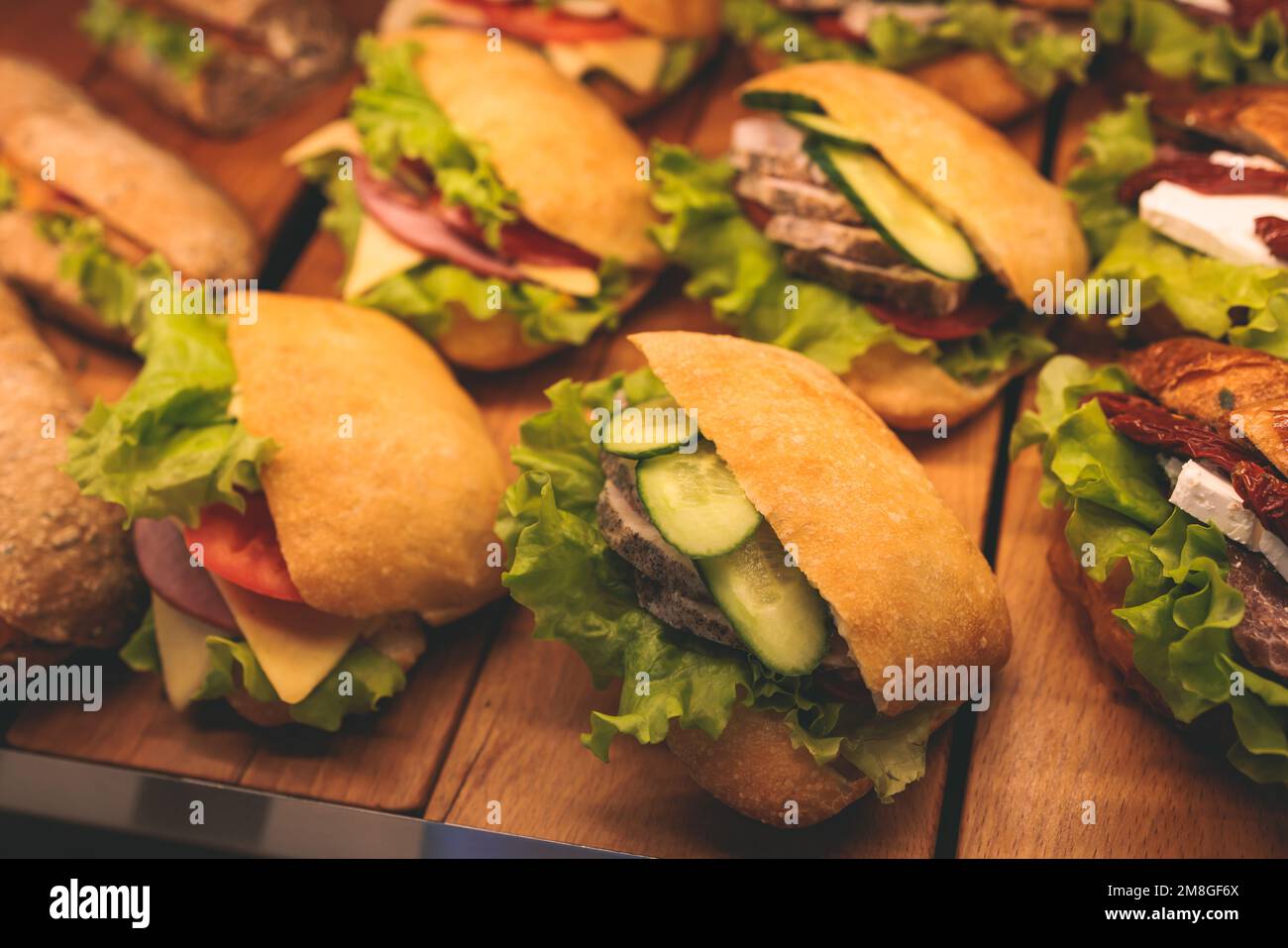 Beautifully decorated catering banquet table with different food snacks ...