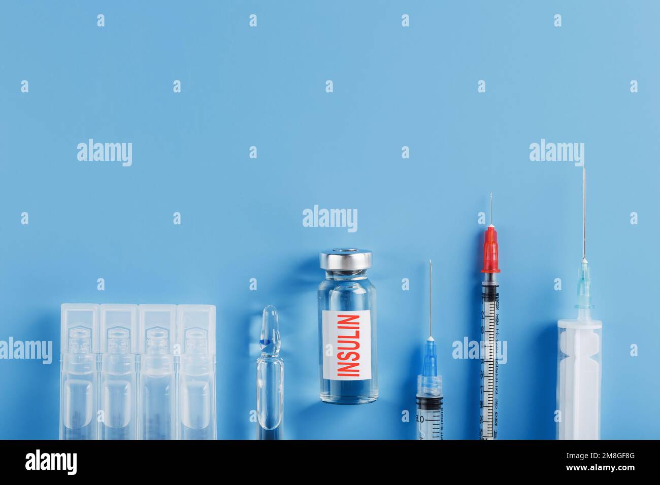 Ampoule bottle with insulin, needles and syringes for medical ...