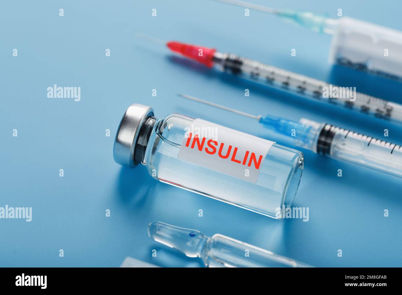 Ampoule bottle with insulin, needles and syringes for medical ...