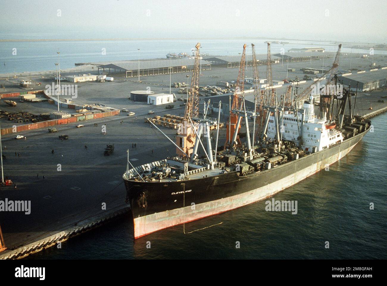 The cargo ship SS CLEVELAND loaded with military transport trucks for ...
