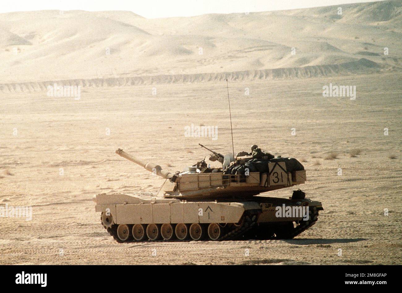 An M-1A1 Abrams main battle tank of Co. A, 3rd Bn., 32nd Armored Regt ...