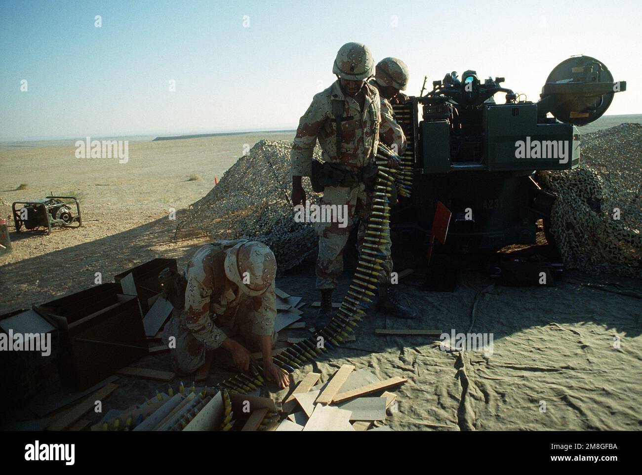 Members of the 3rd Battalion, 4th Air Defense Artillery load ...