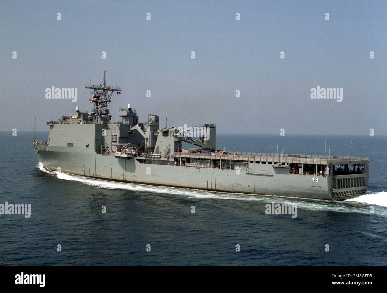 A port quarter view of the dock landing ship ASHLAND (LSD-48) underway ...