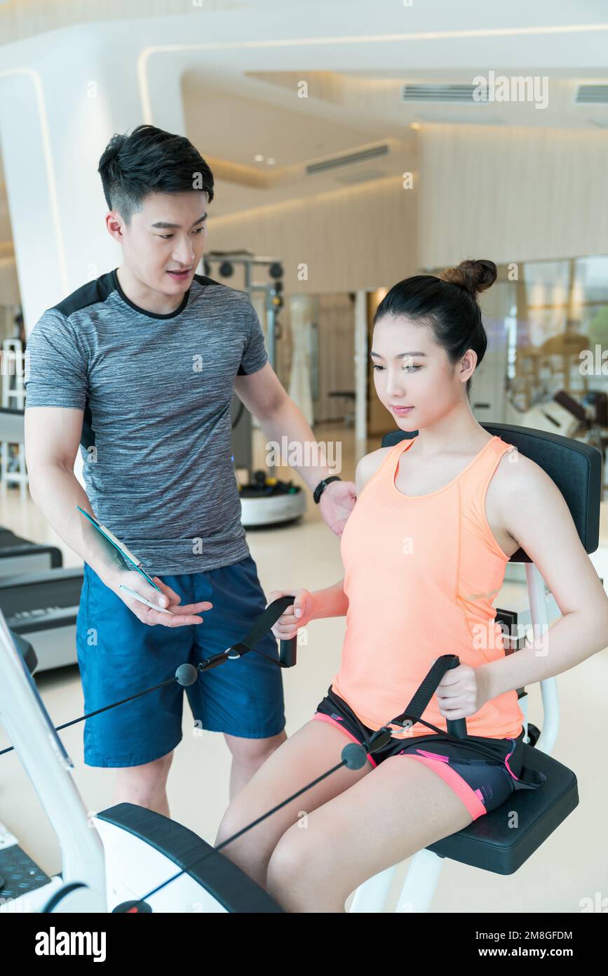 A young woman in private teaching under the guidance of fitness Stock ...