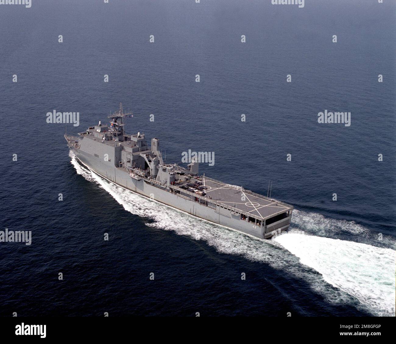 A port quarter view of the dock landing ship ASHLAND (LSD-48) underway ...