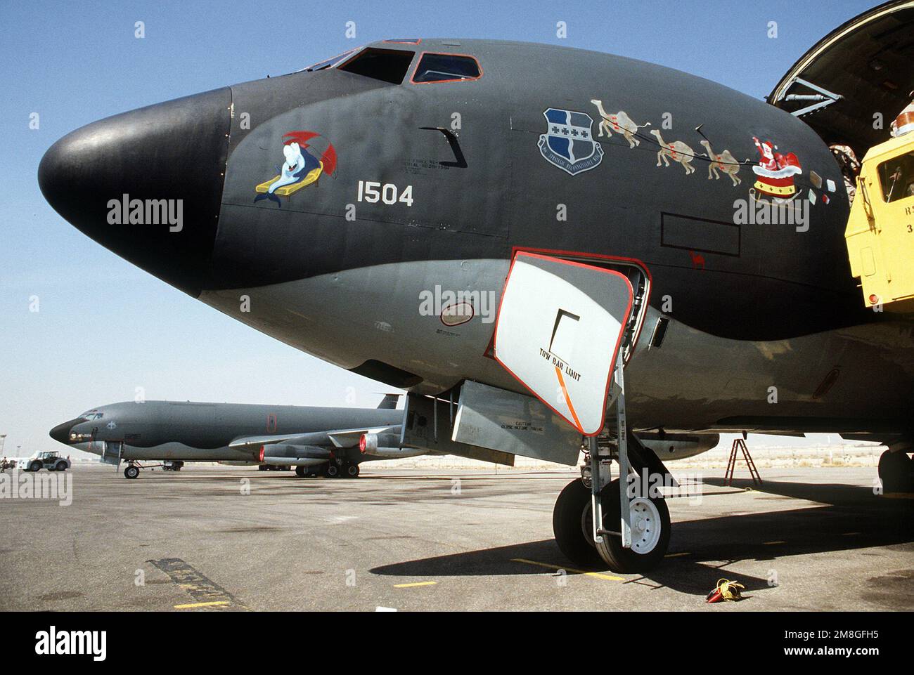 Painted with Santa and his camels, a KC-135 Stratotanker aircraft from ...