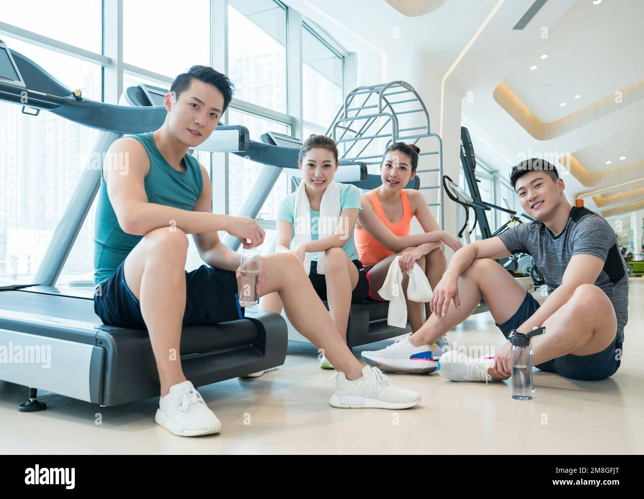 Young people in the gym Stock Photo - Alamy