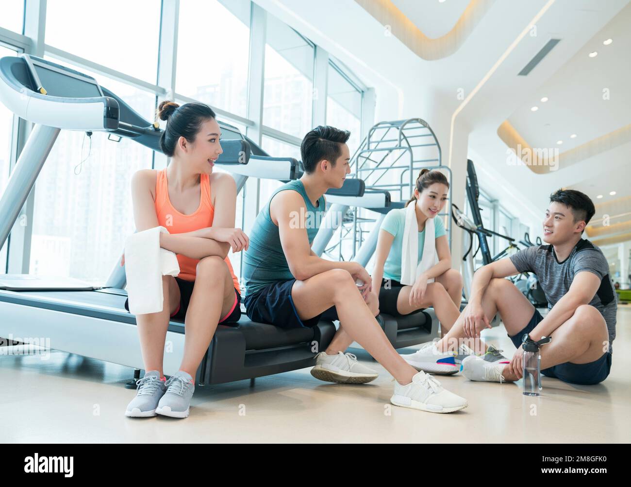 Young people in the gym Stock Photo - Alamy