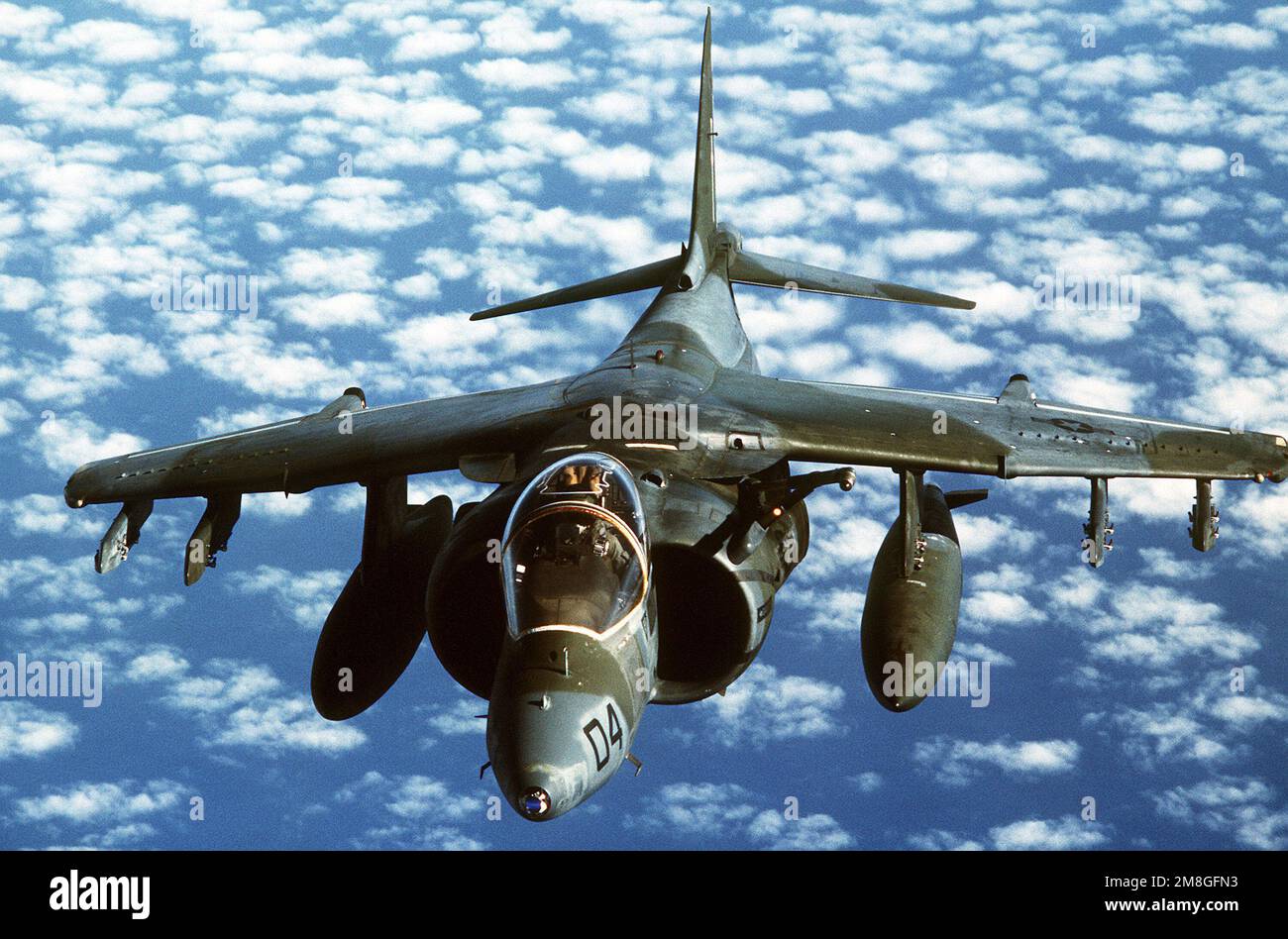 An air-to-air view of a U.S. Marine Corps AV-8B Harrier II attack ...