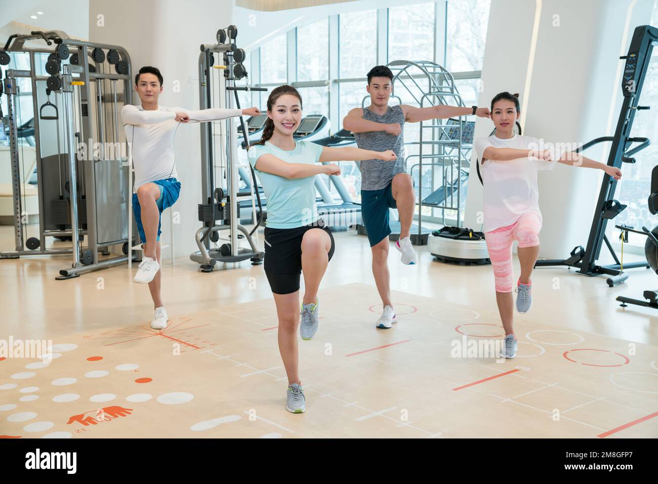 Young people in the gym Stock Photo - Alamy