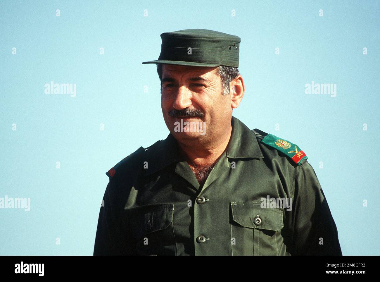 The commanding general of the Syrian army forces reviews his troops ...