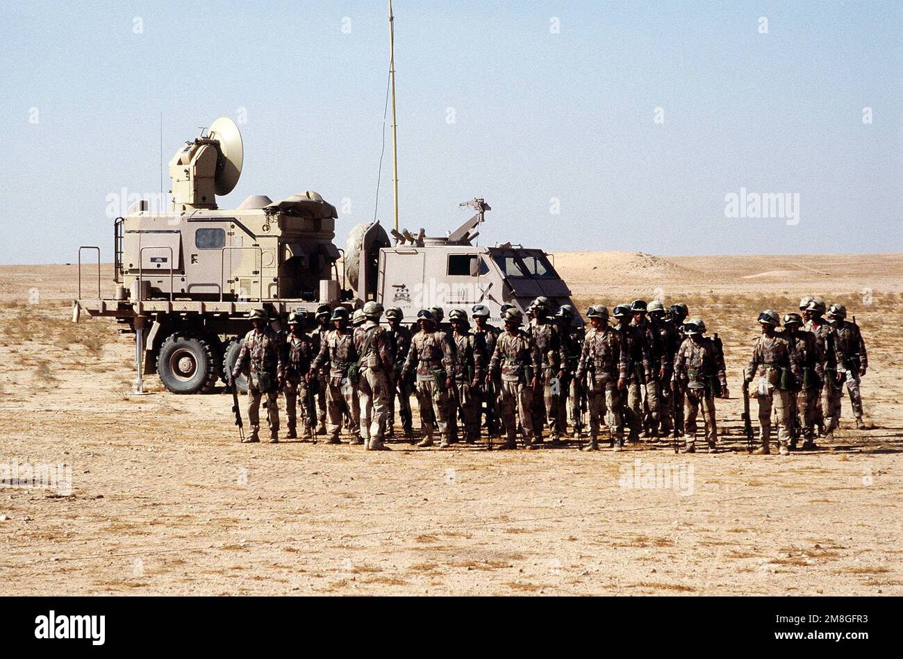 Saudi Arabian soldiers stand in formation prior to the arrival of ...