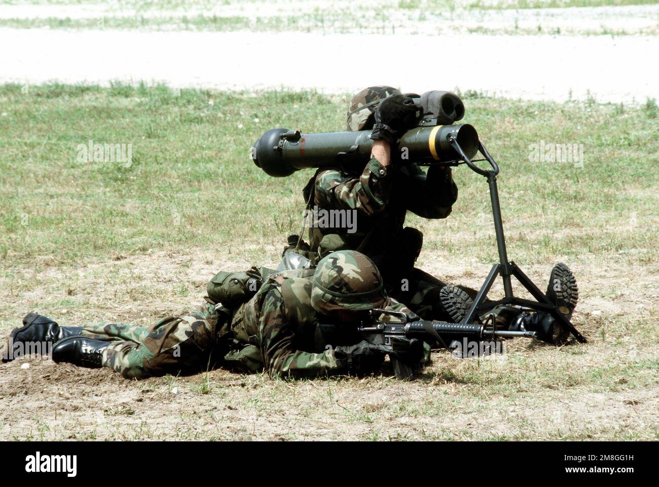 While sitting in the ready to fire position, a combat infantry Marine ...