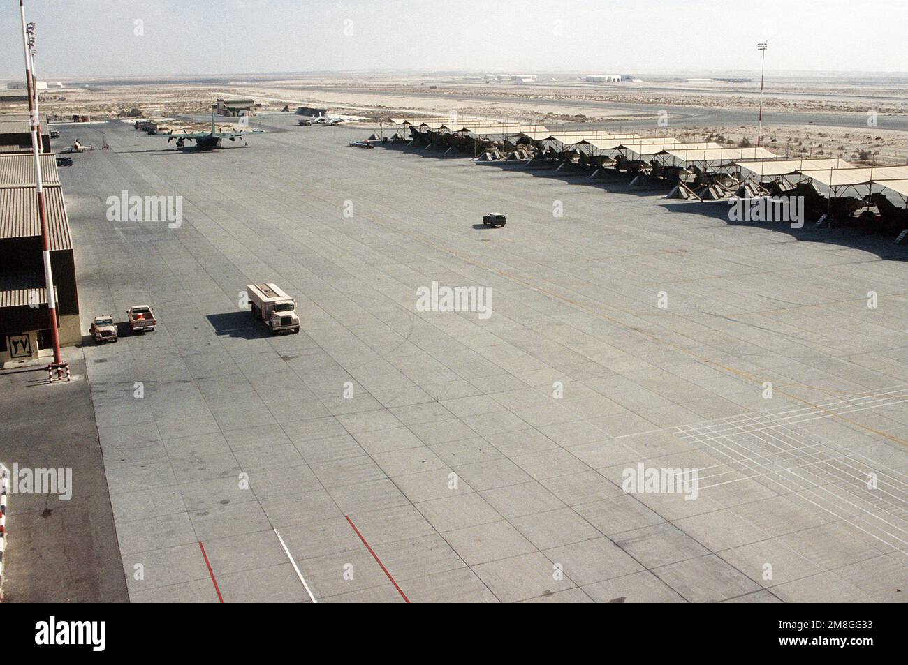 The parking ramp with covered parking spots for aircraft of the 363rd ...