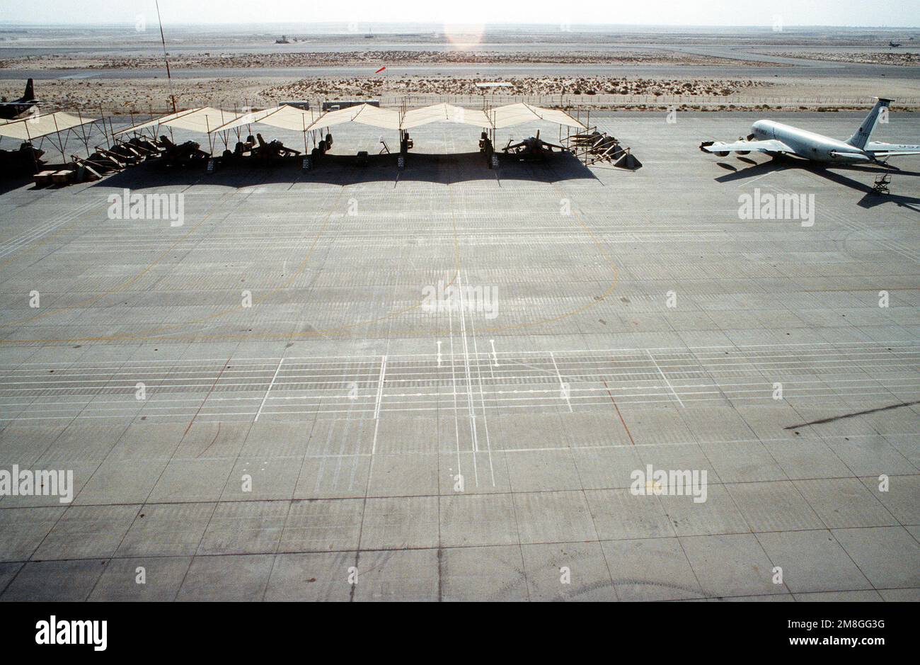 The parking ramp with covered parking spots for aircraft of the 363rd ...