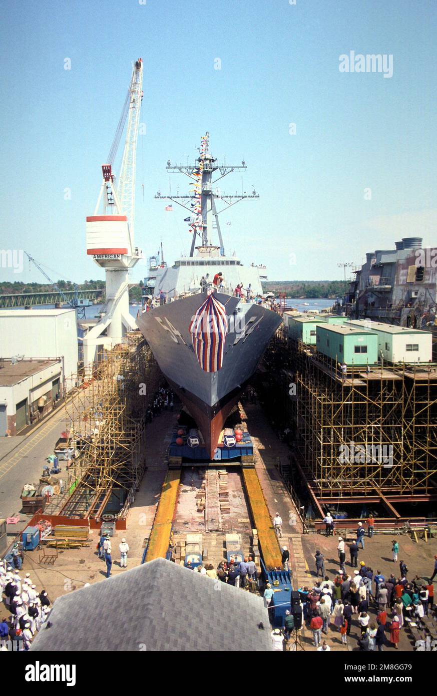 The guided missile destroyer CURTIS WILBUR (DDG-54) slides down the ...