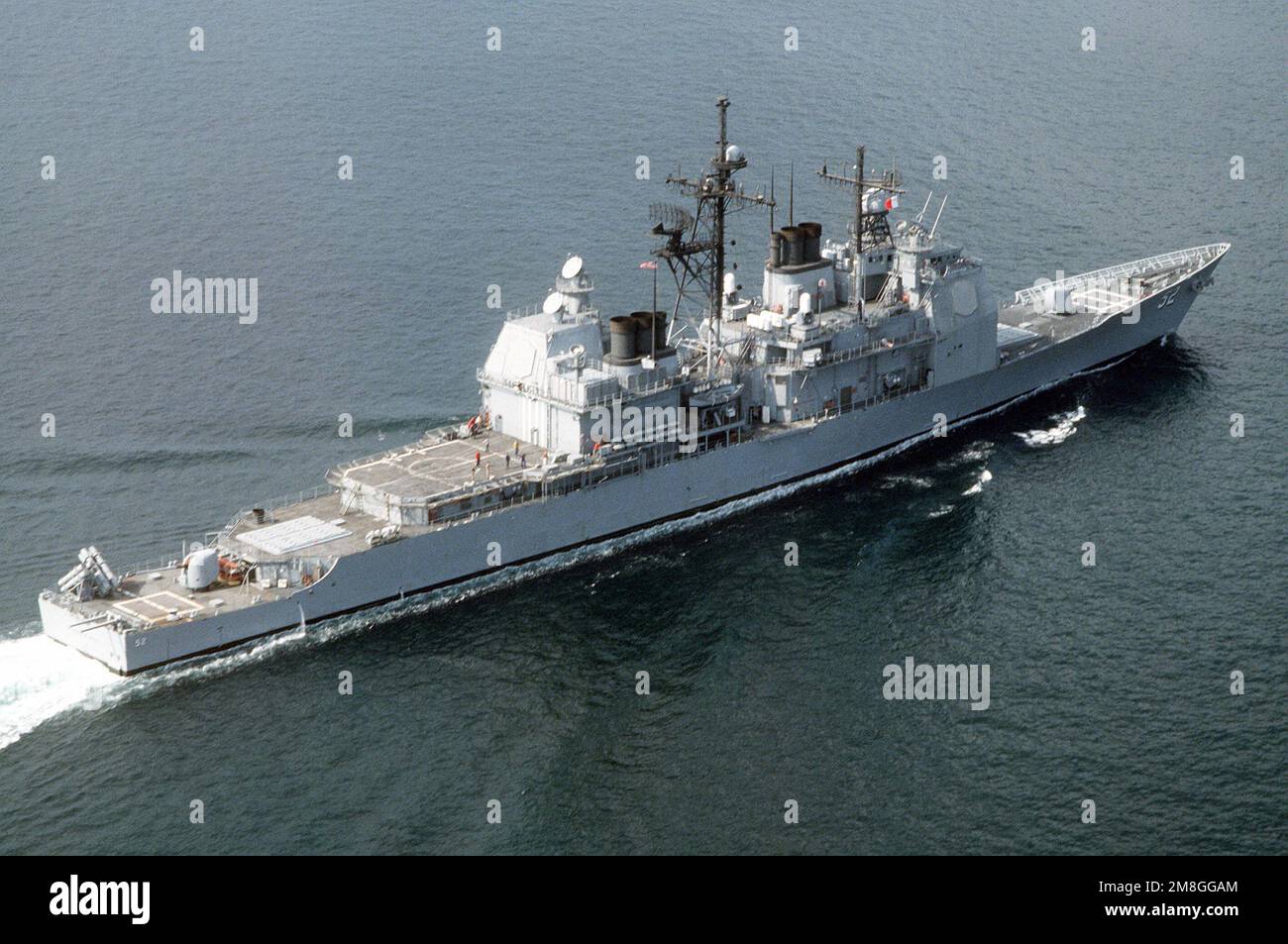 A starboard quarter view of the guided missile cruiser USS BUNKER HILL ...