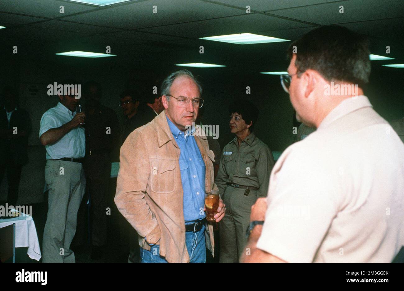 Secretary of Defense Richard Cheney visits with officers on the ...
