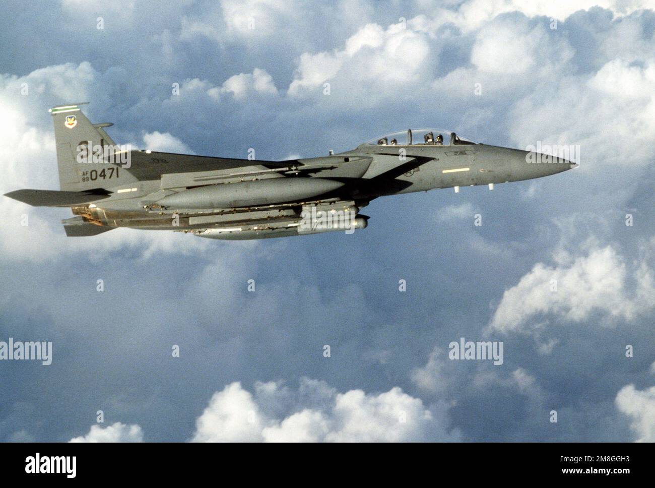 An air-to-air right side view of a 4th Tactical Fighter Wing F-15E ...