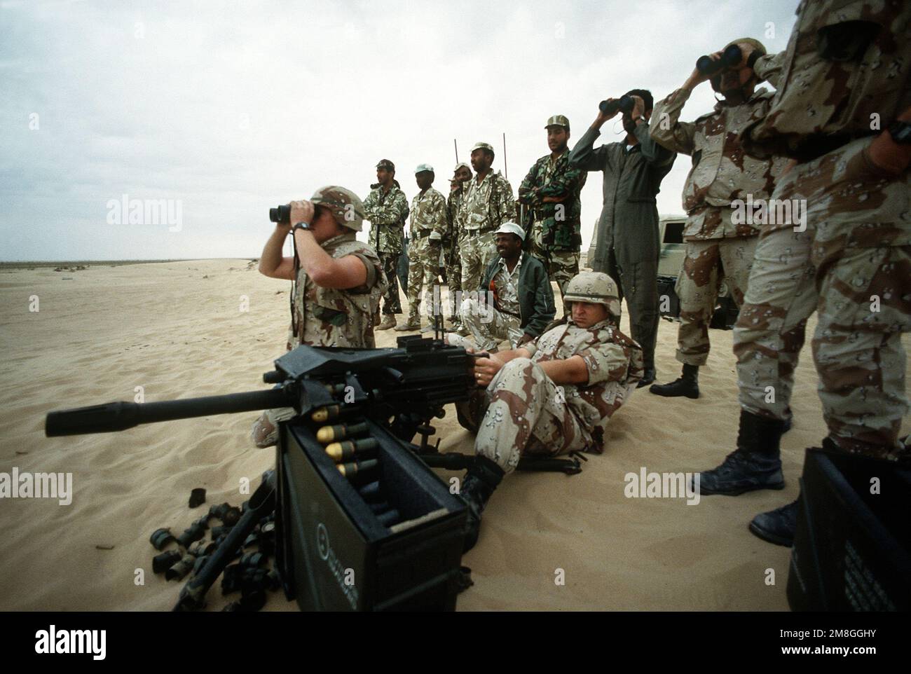 Security policemen demonstrate the 40mm Mark 19 Model 3 grenade ...