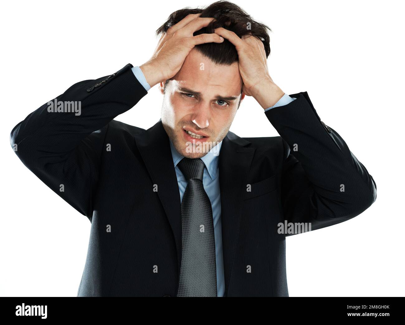 Face, stress and burnout business man in studio isolated on a white ...