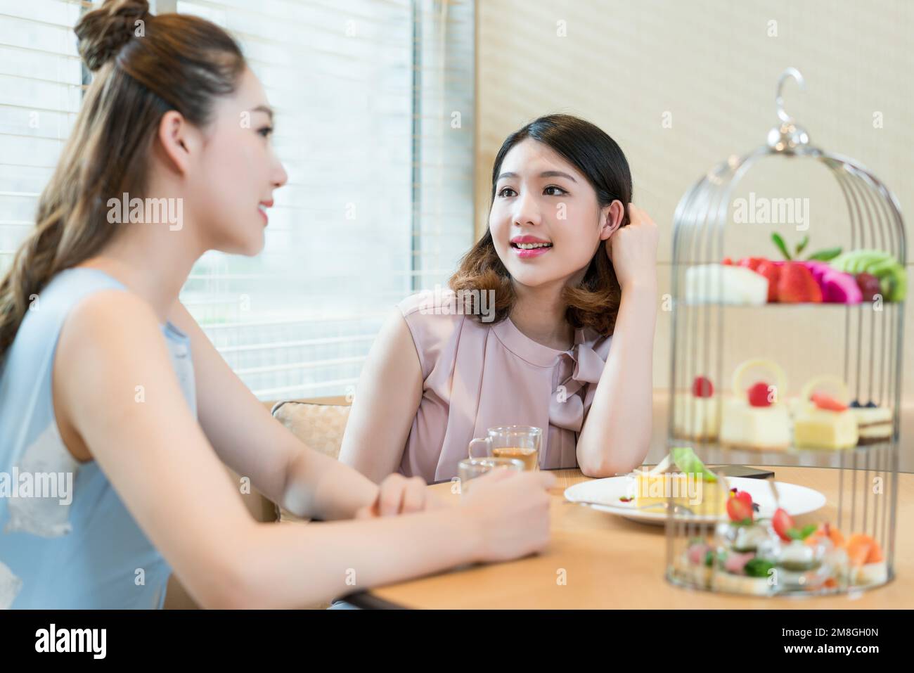 Young woman's afternoon tea time Stock Photo - Alamy