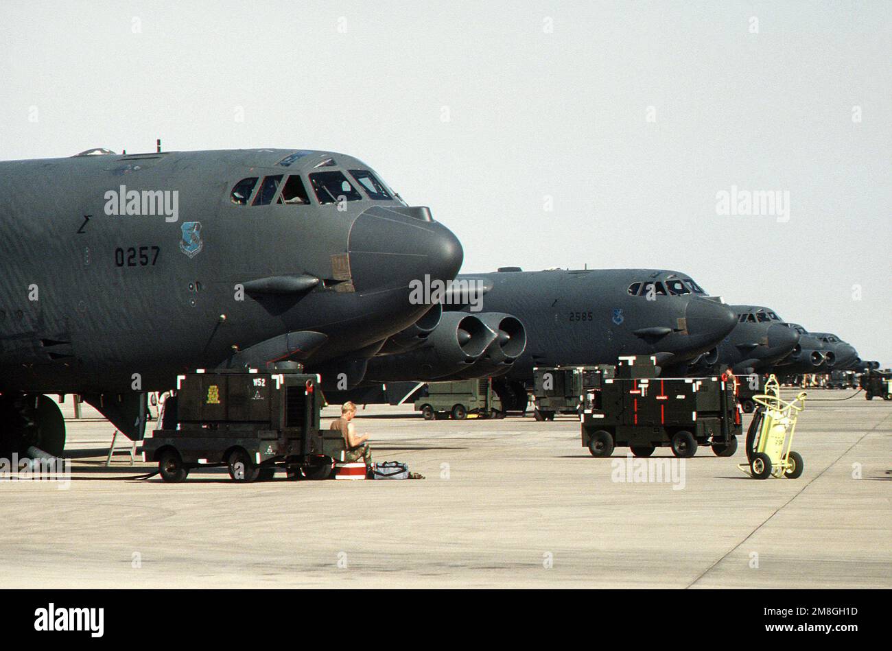 Members of the 1708th Munitions Maintenance Squadron transport M-117 ...