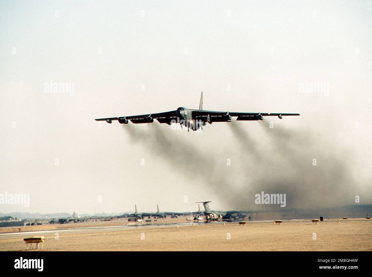 A U.S. Air Force B-52G Stratofortress aircraft takes off on a mission ...