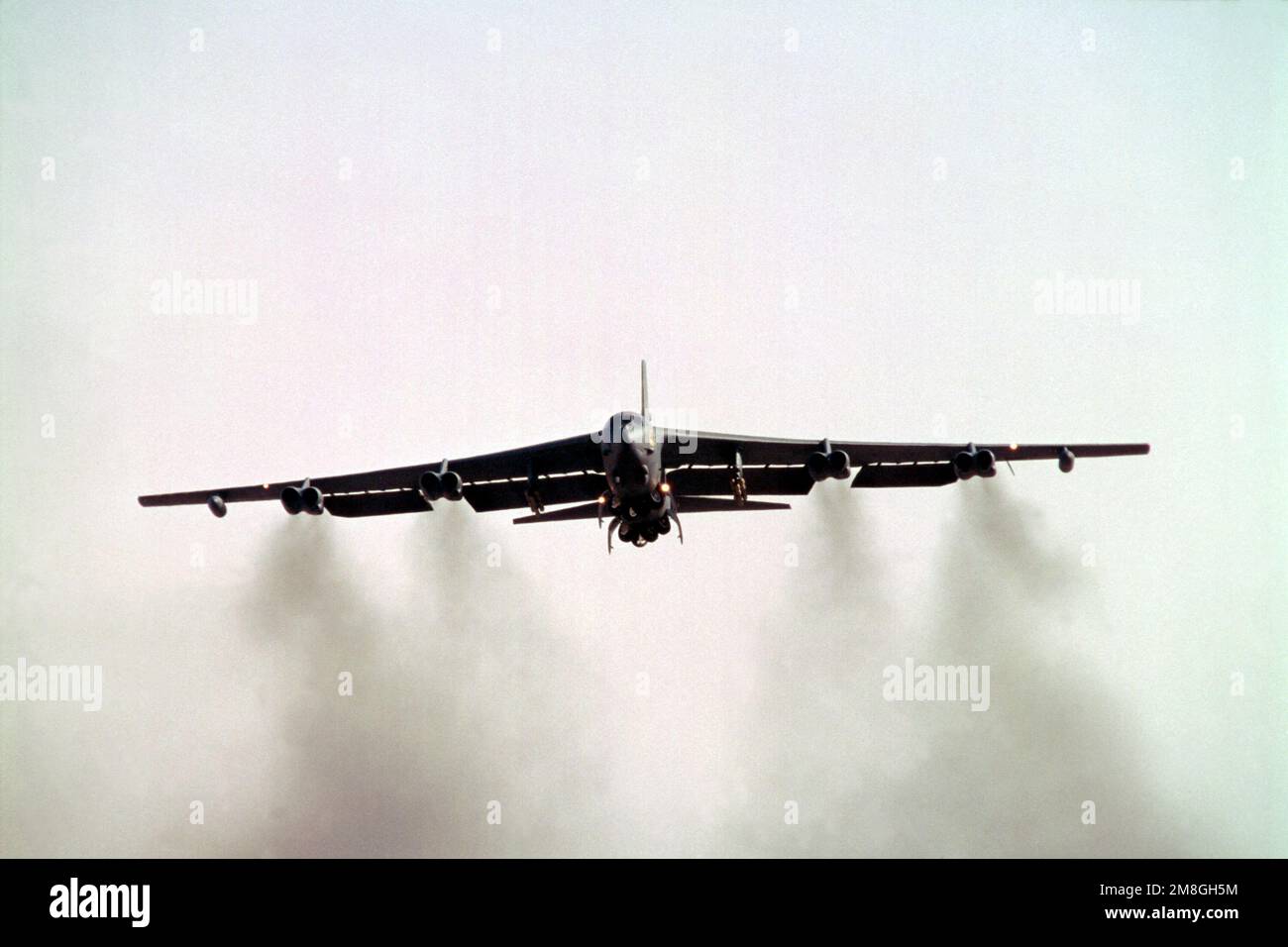 A B-52G Stratofortress bomber aircraft takes off on a mission in ...