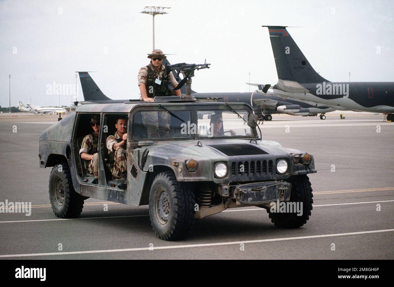 Security specialists from the 1701st Security Police Squadron patrol an ...