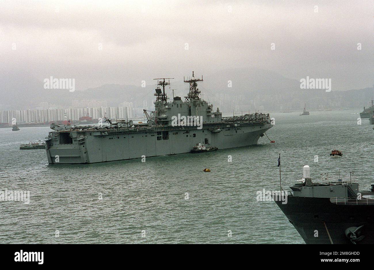 A starboard quarter view of the amphibious assault ship USS TARAWA (LHA ...