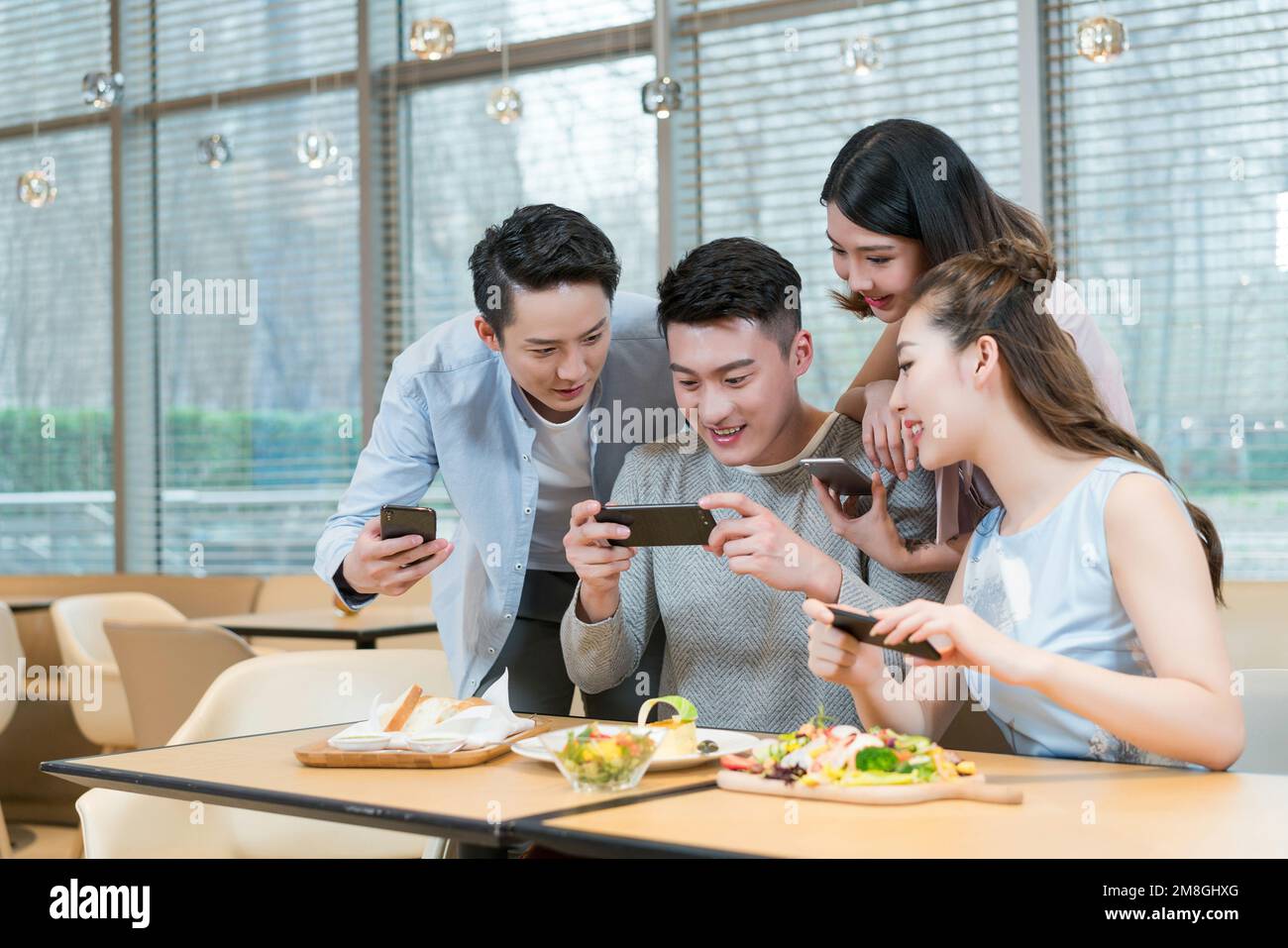 The afternoon tea time of young people Stock Photo - Alamy