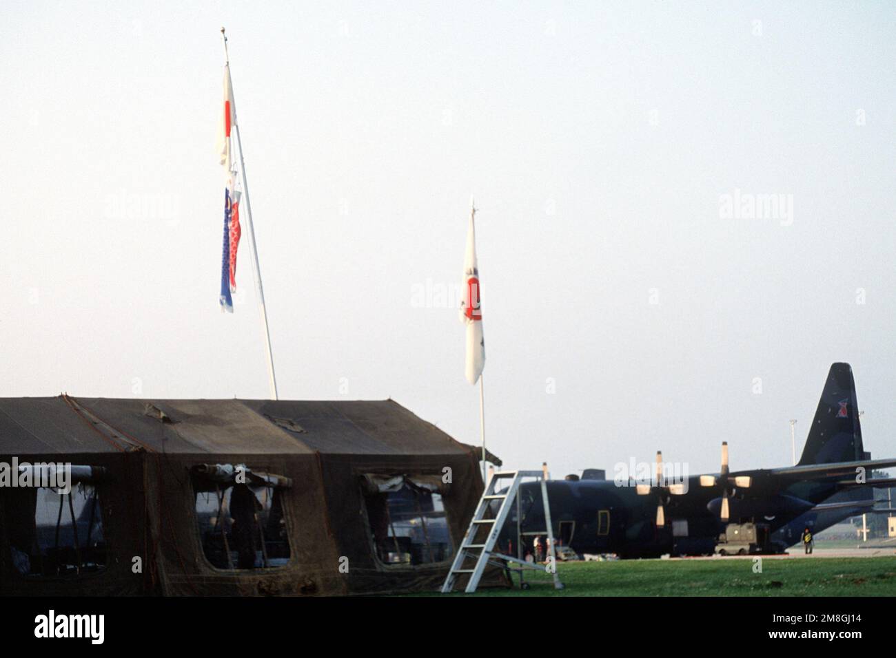 Tent and flags of the First Tactical Airlift Group from the Japan Air ...