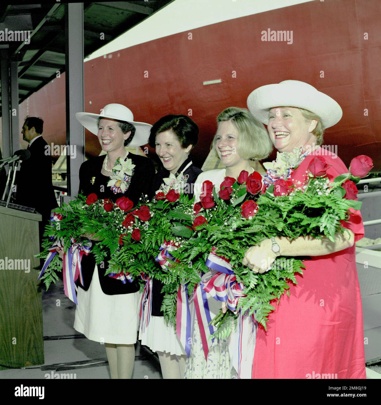 The sponsors of the surveying ship USNS WATERS (T-AGS-45) pose for a ...