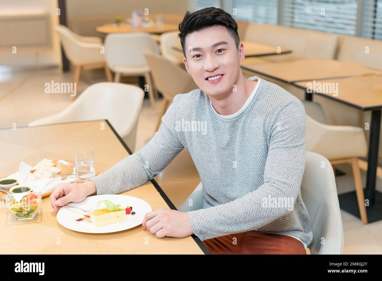 The young man's afternoon tea time Stock Photo - Alamy