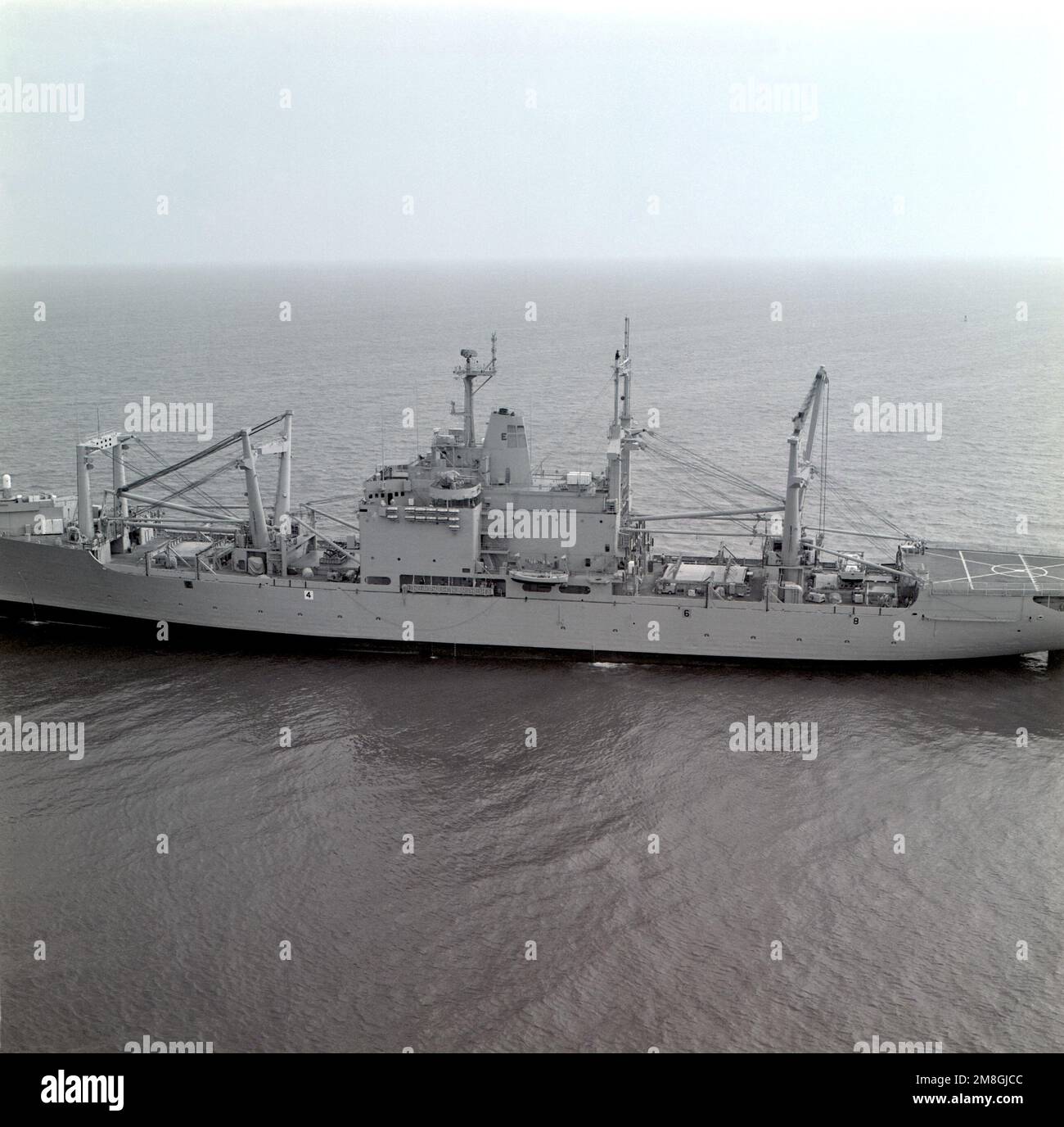 A port beam view of the amphibious cargo ship USS EL PASO (LKA-117) at ...
