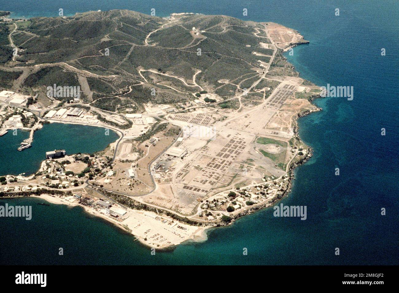 An aerial view of the tent city erected on an unused runway to temporarily house Haitian ...