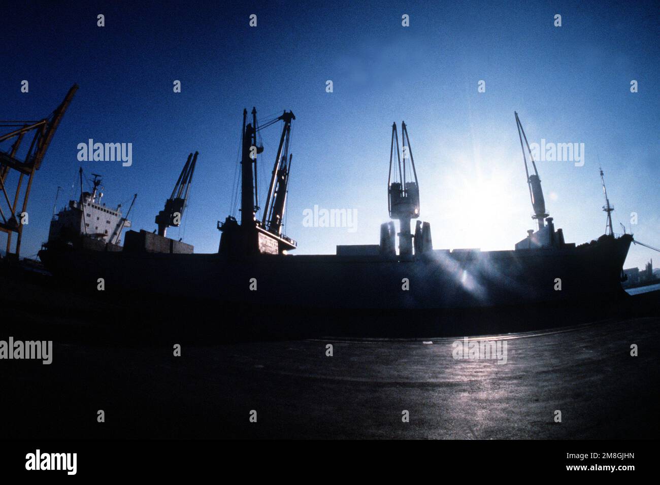 A silhouette of the Military Sealift Command-chartered prepositioning ...