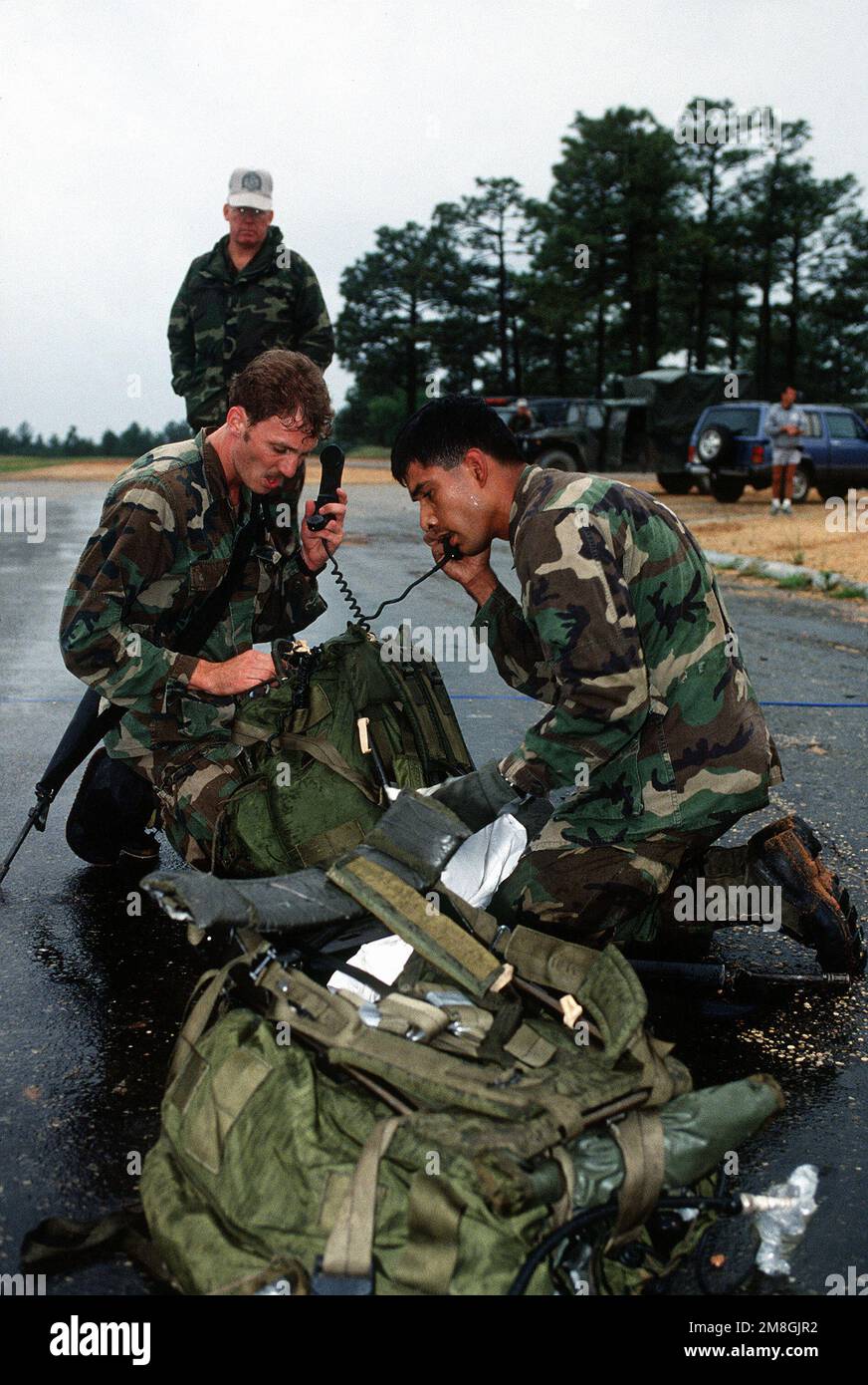 STAFF SGT. Ray Bolinger (left) of the 62nd Combat Control Squadron ...