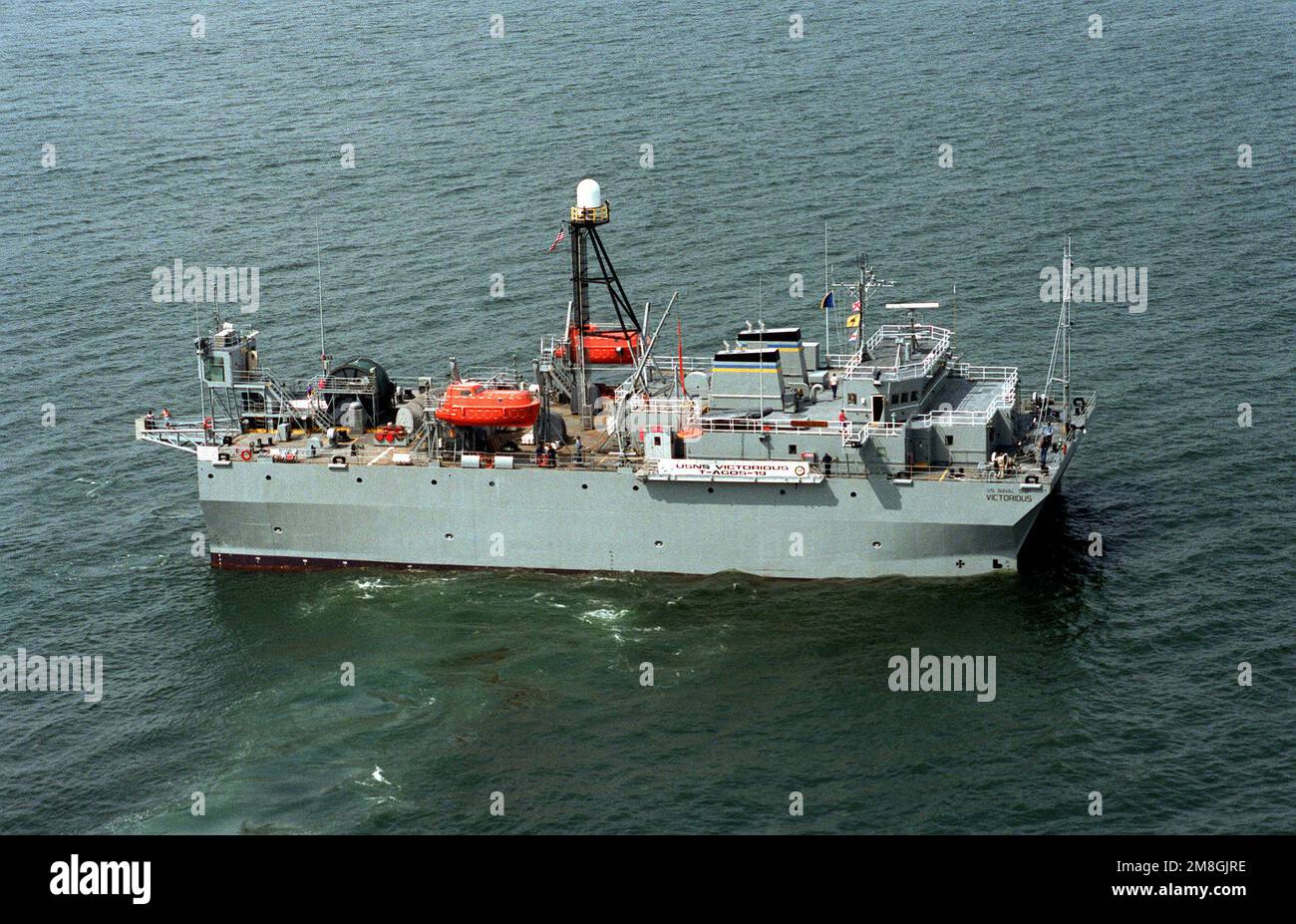 A starboard beam view of the ocean surevillance ship USNS VICTORIOUS (T ...