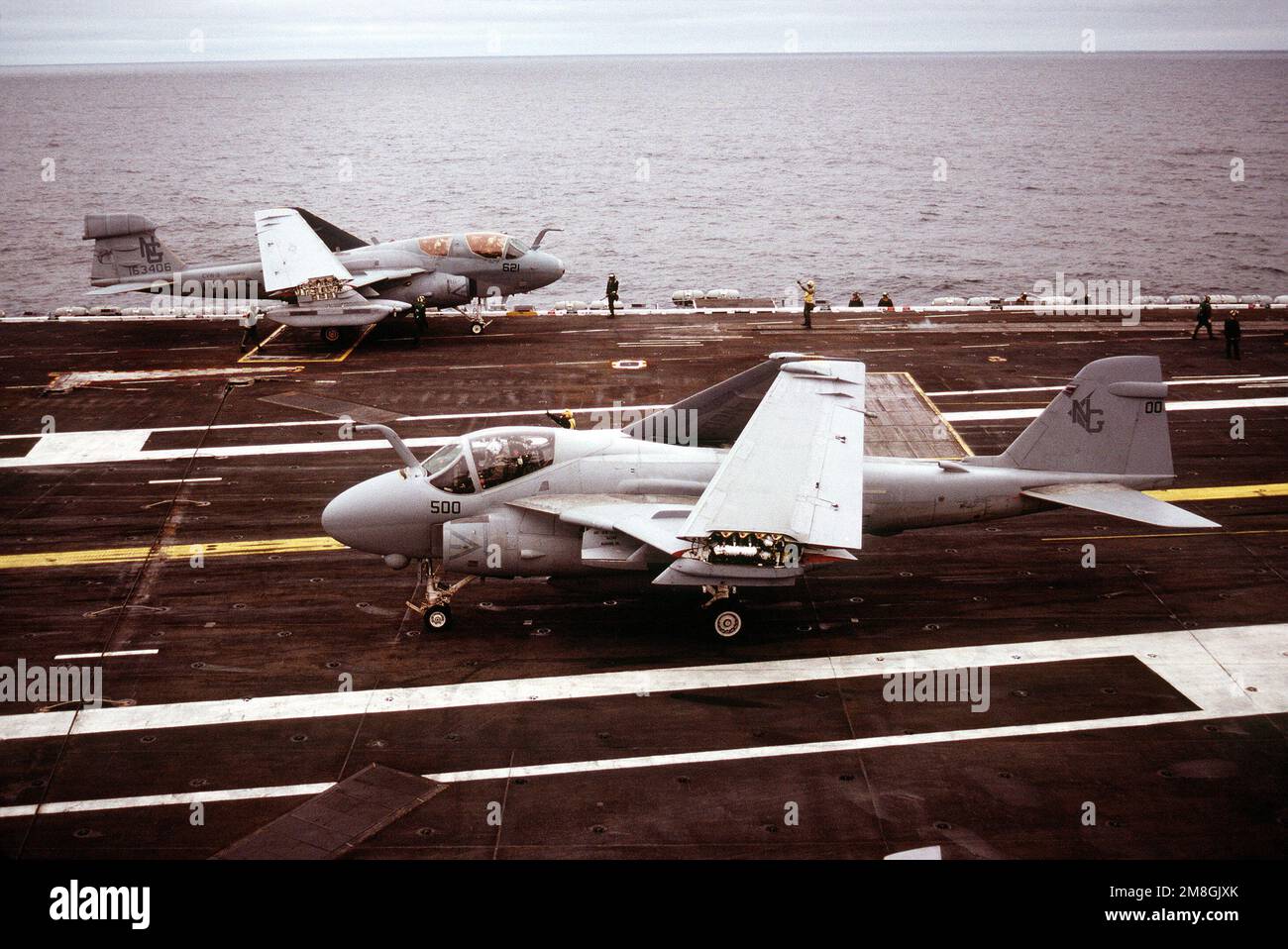 An A-6E Intruder aircraft of Attack Squadron 165 (VA-165) taxis on the ...